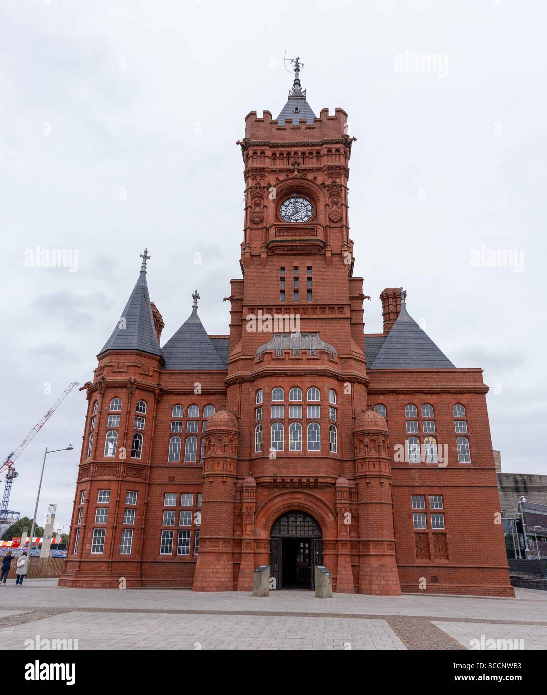 CARDIFF, UK - AUGUST 8, 2025 - Red brick Pierhead Building with clock ...
