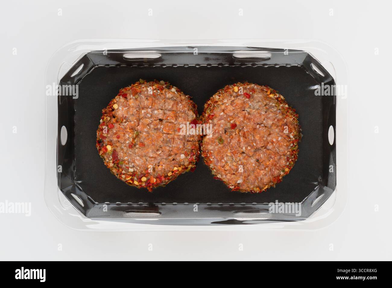 Fresh Chili Burger Filling in plastic box top view isolated nature ...