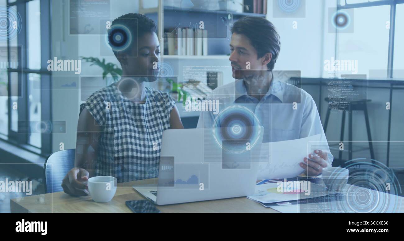 Reviewing charts business professionals hi-res stock photography and ...