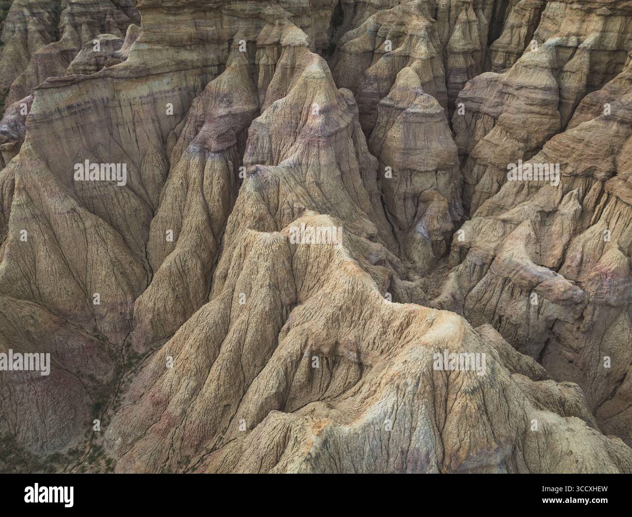 Aerial view of the dramatic, layered cliffs of Tsagaan Suvarga ...