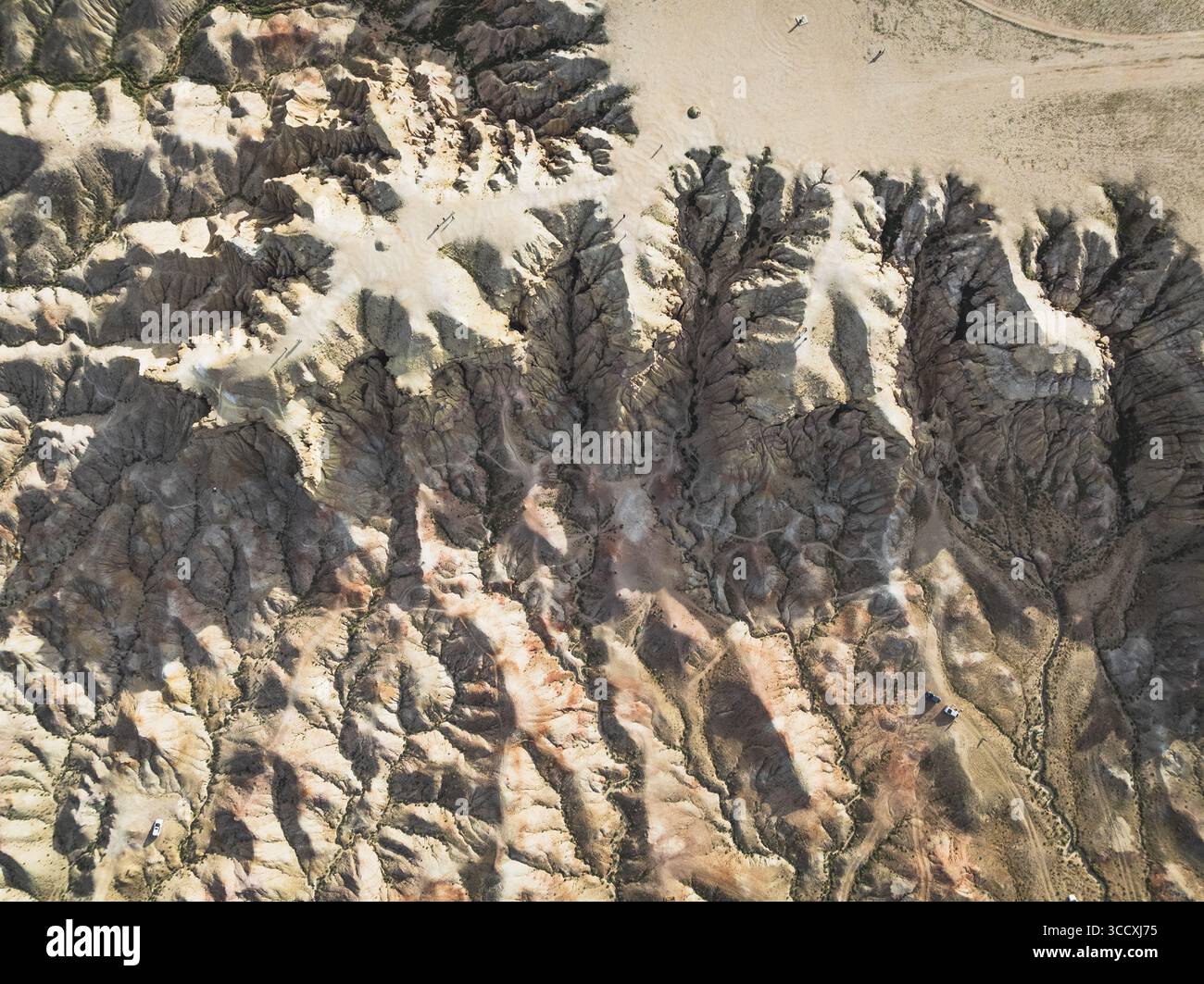 Aerial view of the stark, eroded landscape of Tsagaan Suvarga reveals a ...