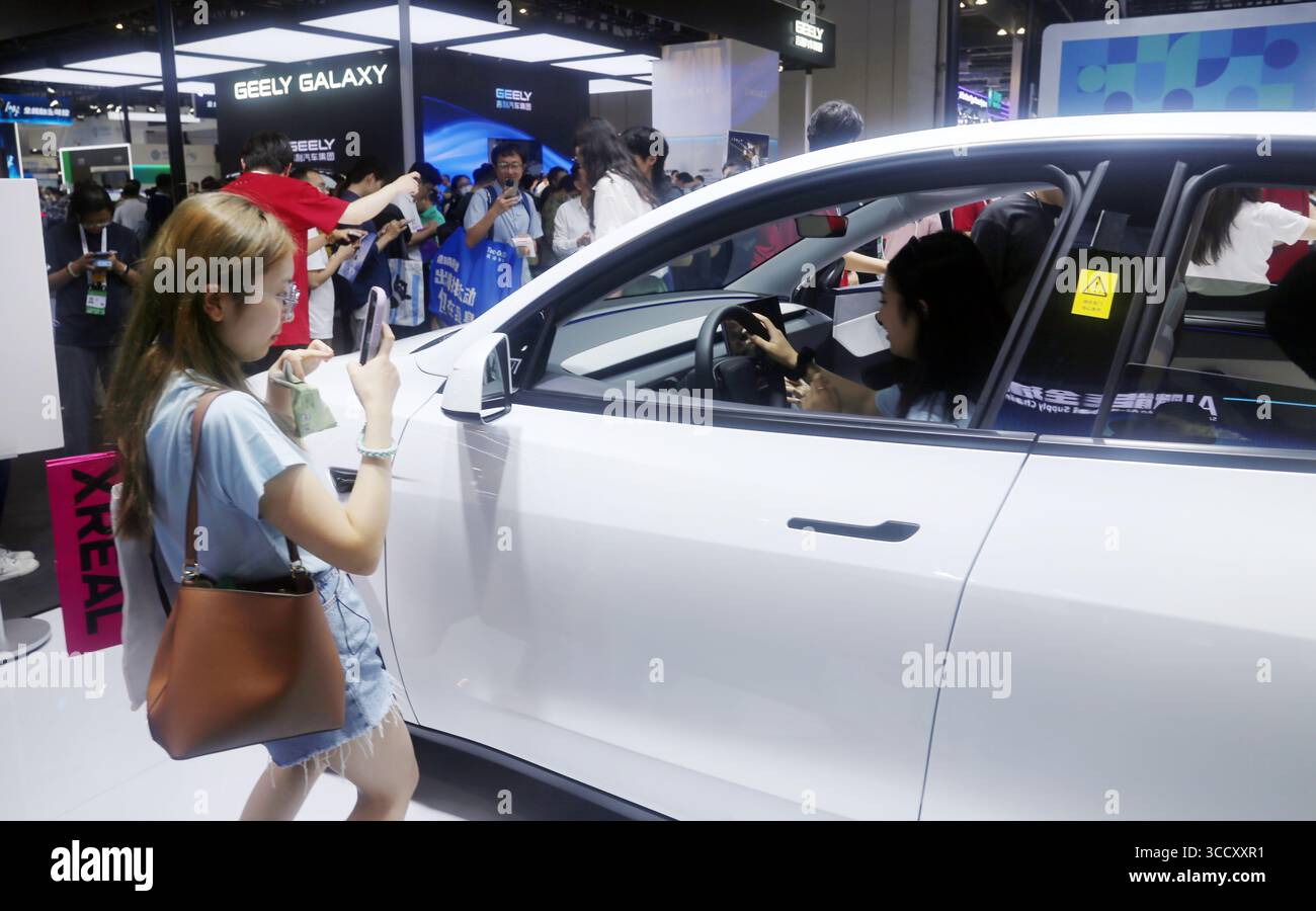 SHANGHAI, CHINA - JULY 26, 2025 - Visitors visited TESLA's booth at the ...