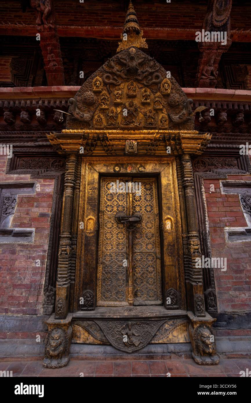 Close-up look of the gold ornamental door in Patan Durbar Palace in ...