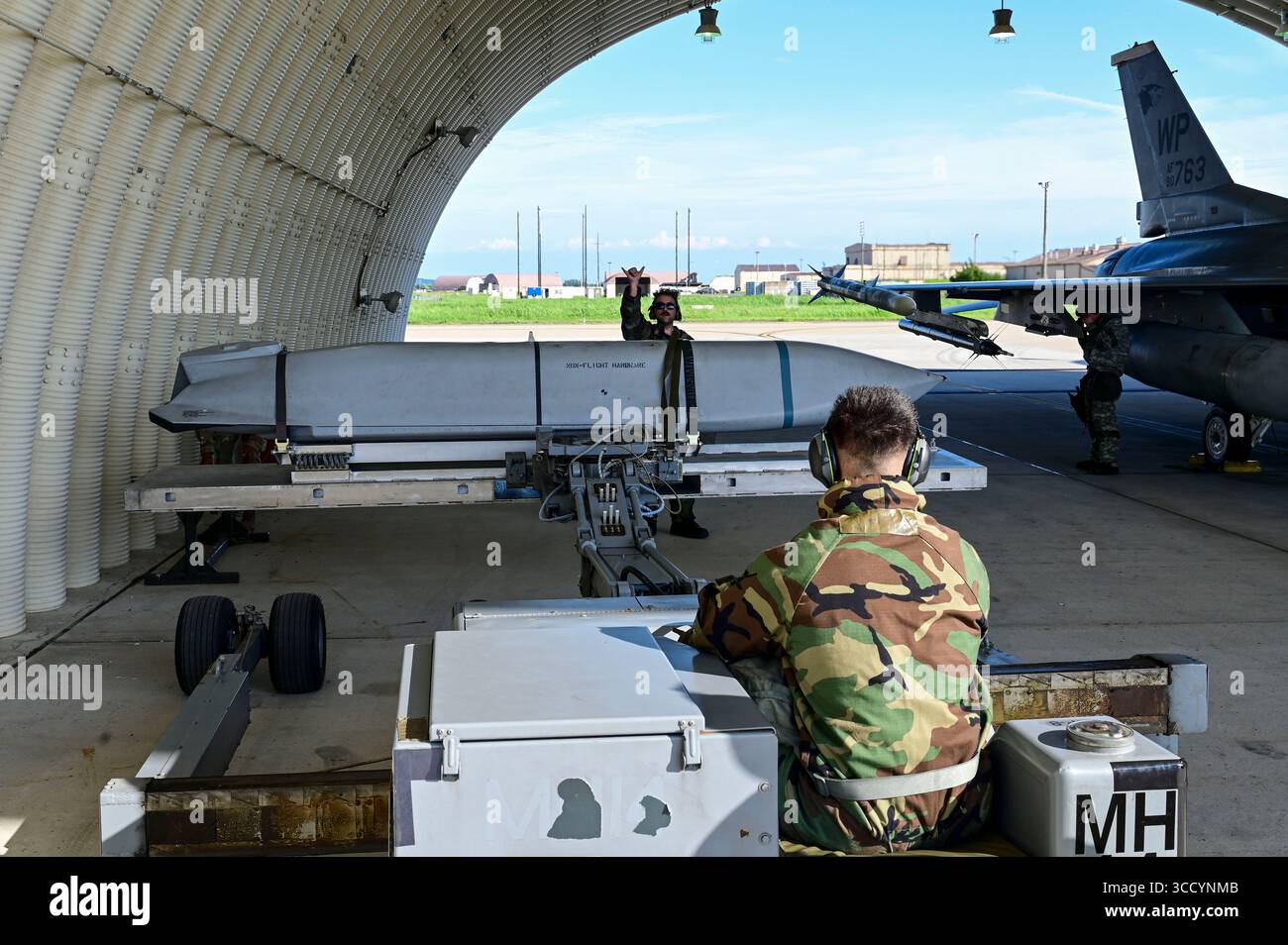 Airman Nathan Nguyen, 35th Fighter Generation Squadron weapons load ...