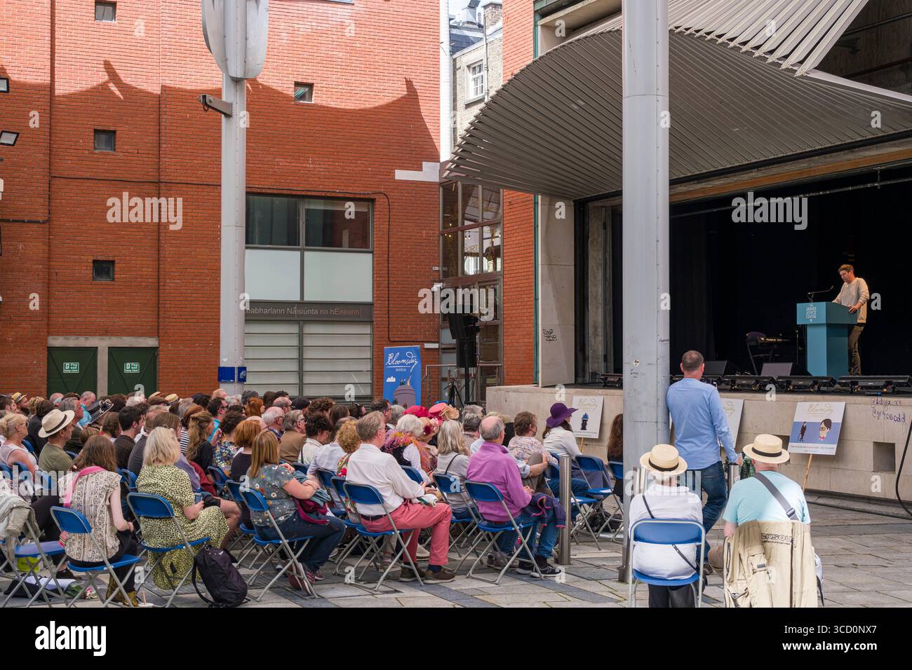 Audience listening to a reading of James Joyce’s 1922 novel Ulysses ...