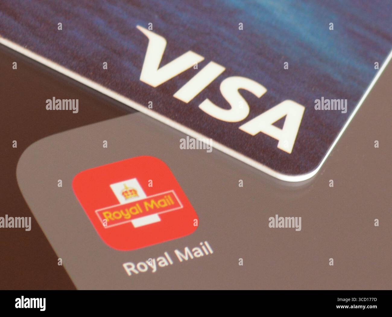 Royal Mail app on smartphone screen with a VISA card to make payment ...