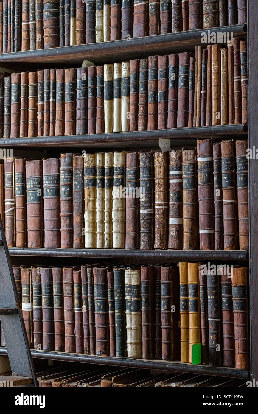 Historic books on bookshelf in the Long Room library chamber, Old ...
