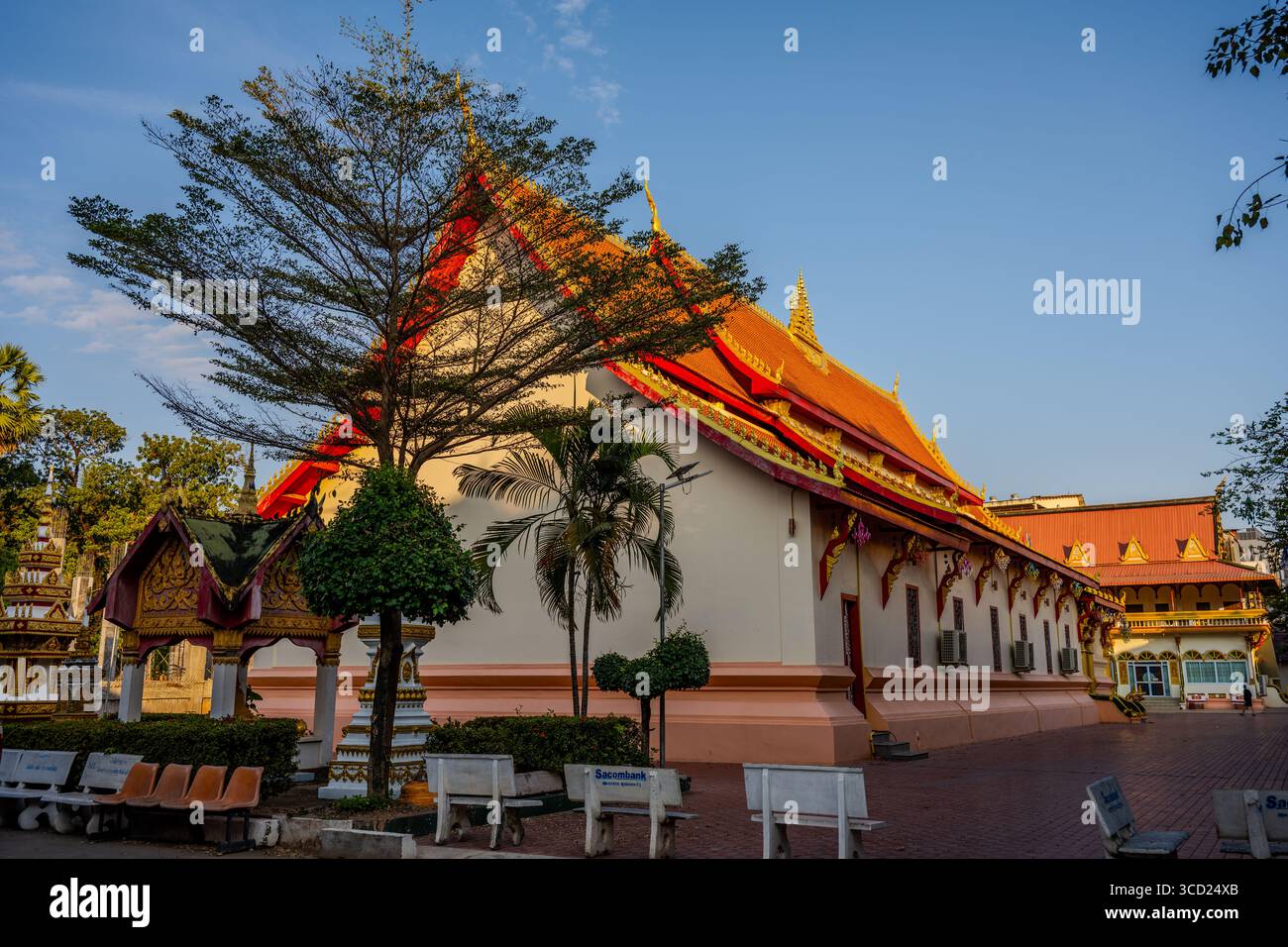 A serene evening view of Wat That Luang Tai, a prominent Buddhist ...