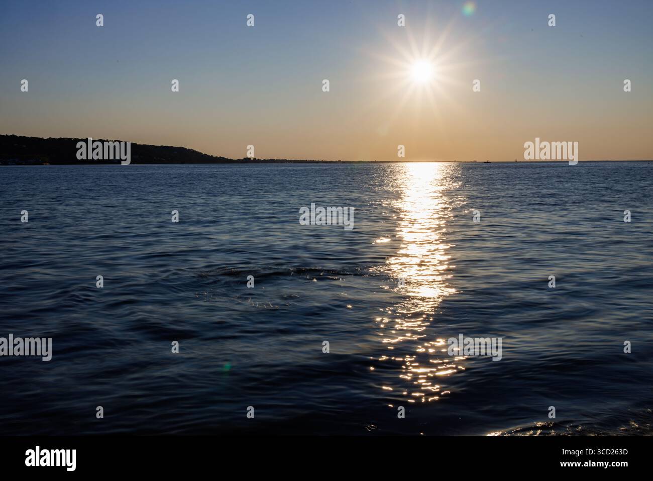 Shimmering sunset reflecting in hi-res stock photography and images - Alamy