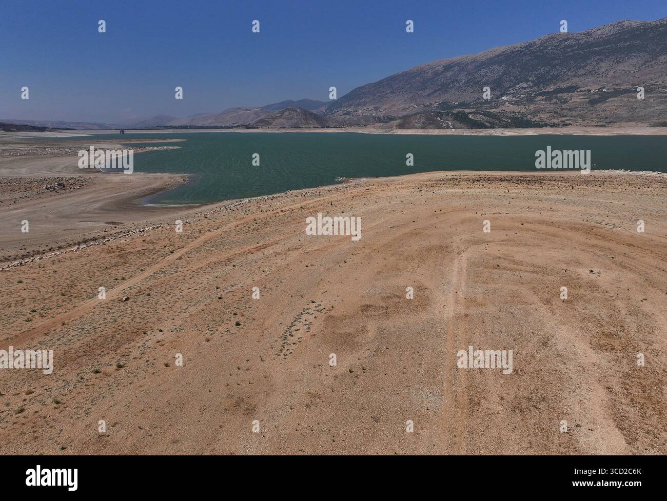 A drone view shows dramatically low water levels at Qaraoun lake, one ...