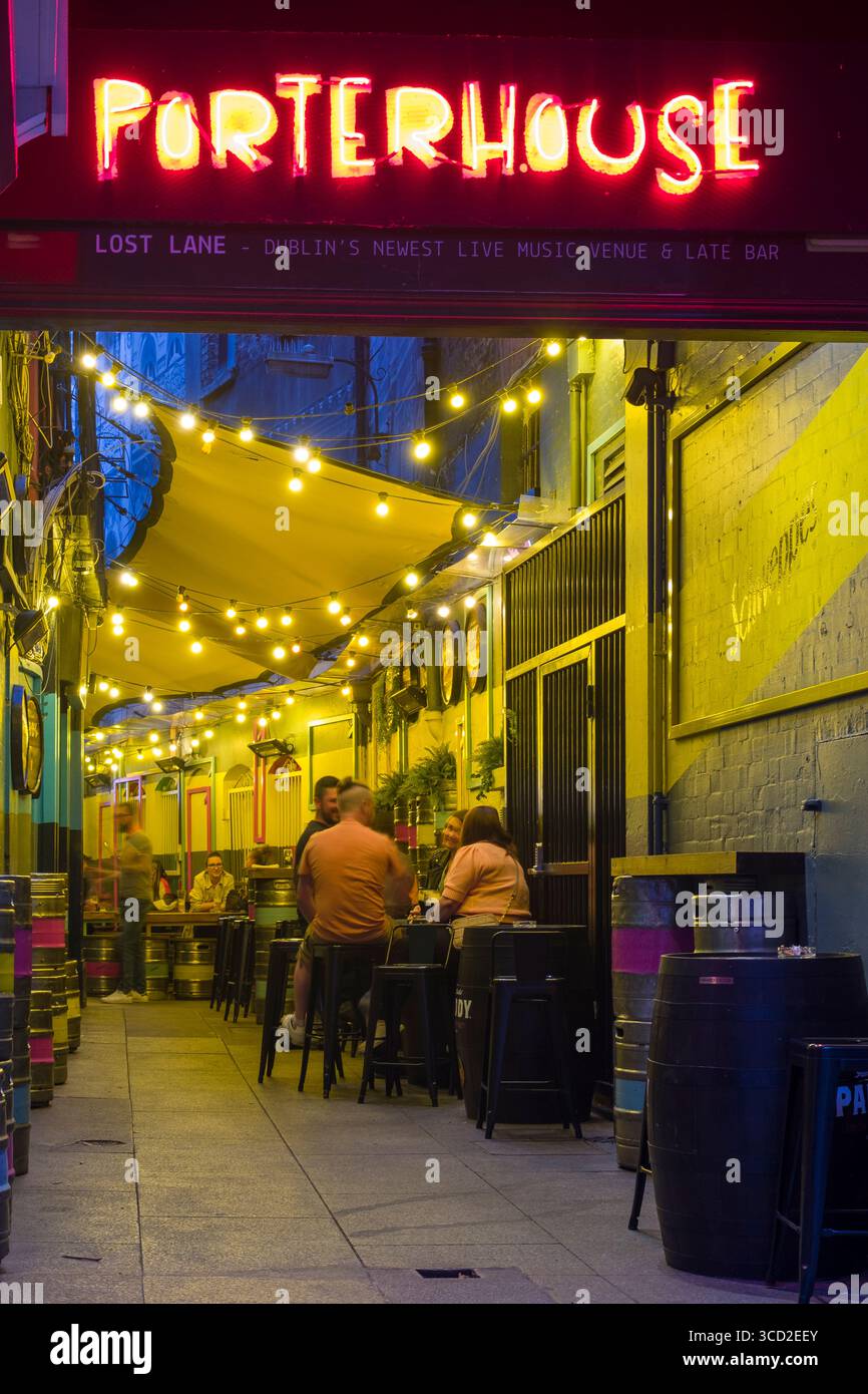 Porterhouse neon sign above outdoor seating at Tapped Late Bar, Grafton ...