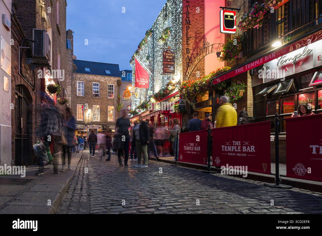 People standing outside the Temple Bar Pub, Temple Lane, Temple Bar ...