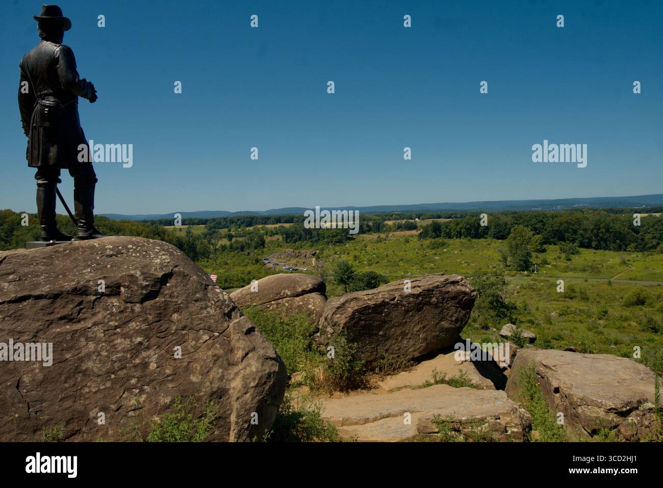 A statue of Major General Warren looking over Little Roundtop in ...