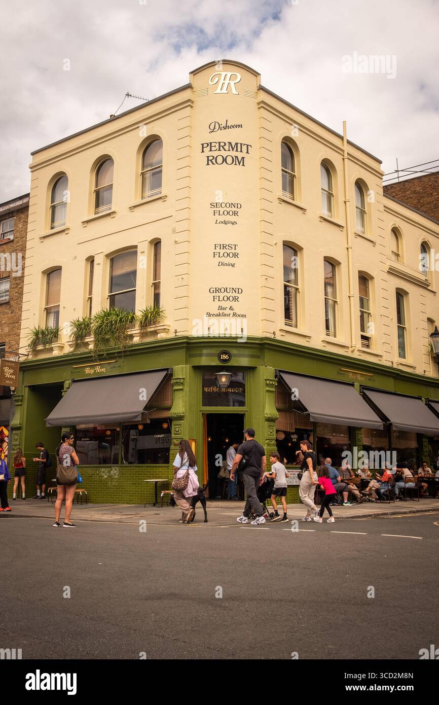 LONDON- JULY 28, 2025: Dishoom Permit Room bar cafe restaurant on ...