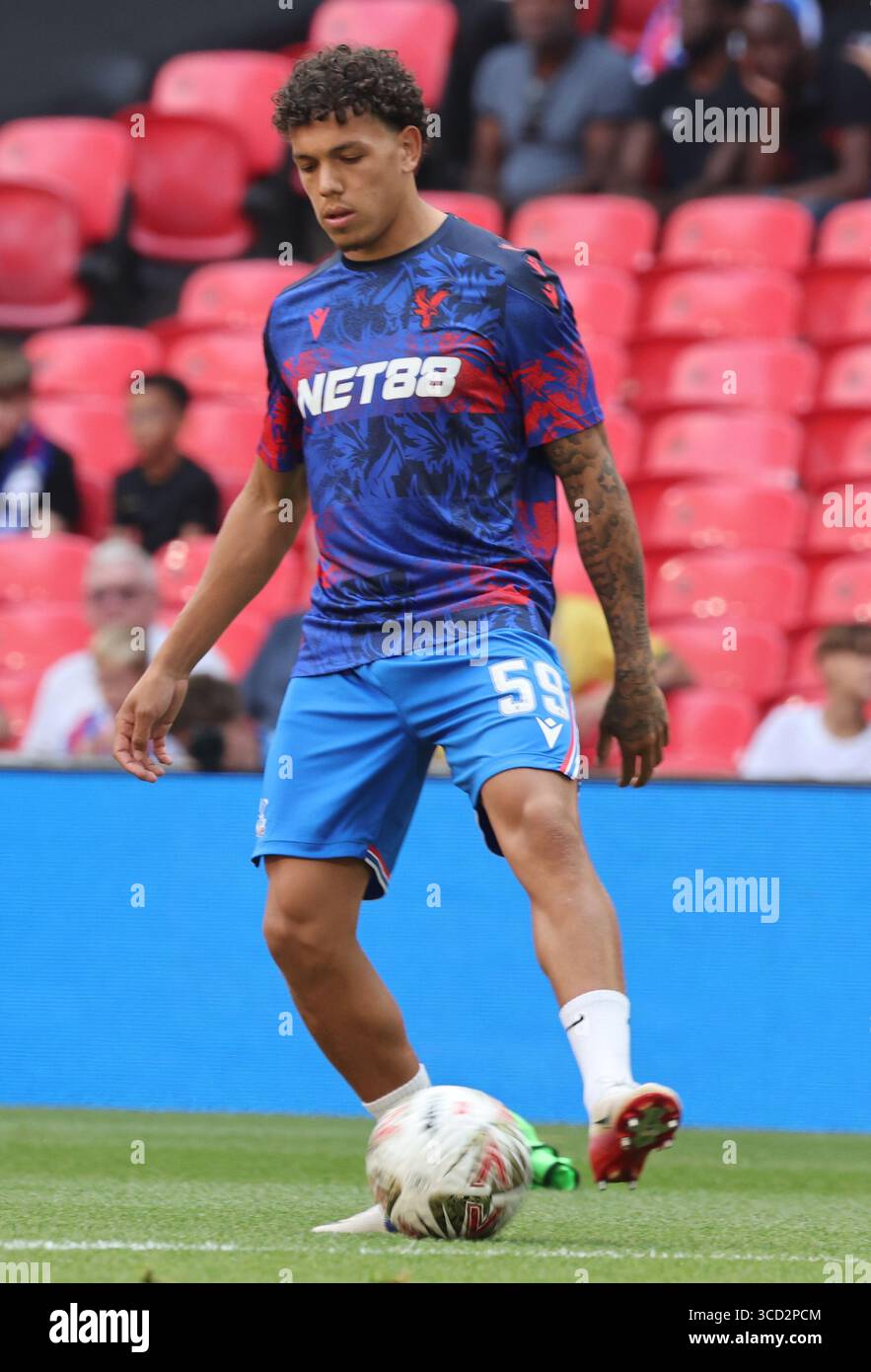 Rio Solomon Cardines of Crystal Palace during the pre-match warm-up ...
