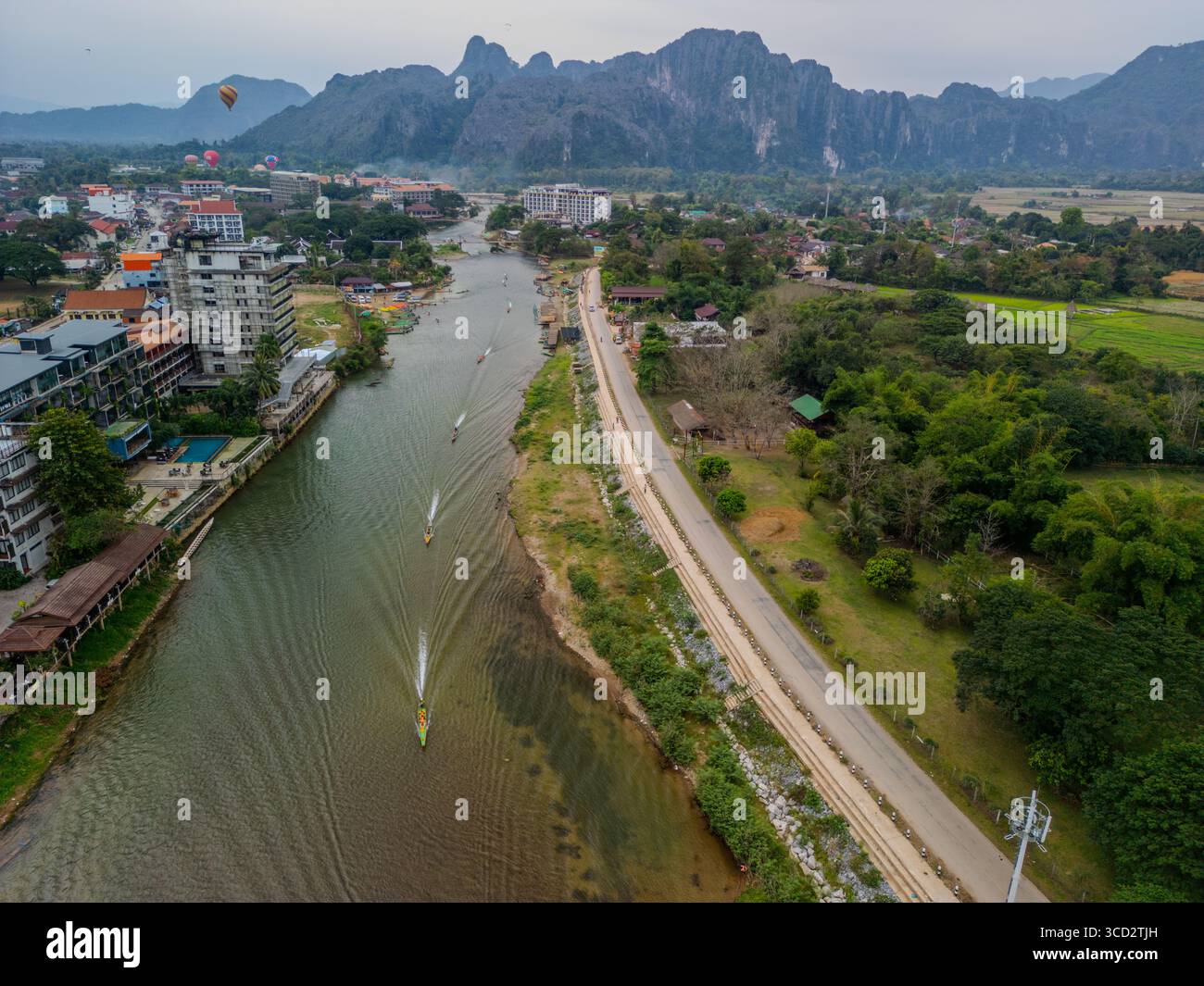 Scenic Aerial View of Nam Song River with Longtail Boats, Riverside ...