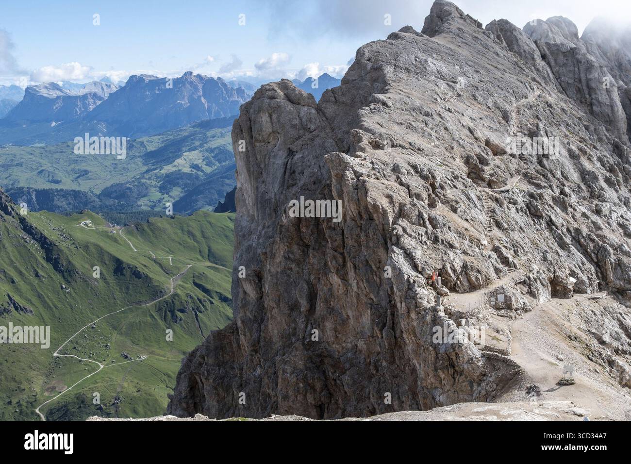 Narrow mountain path on the steep rock face of the Marmolada with ...