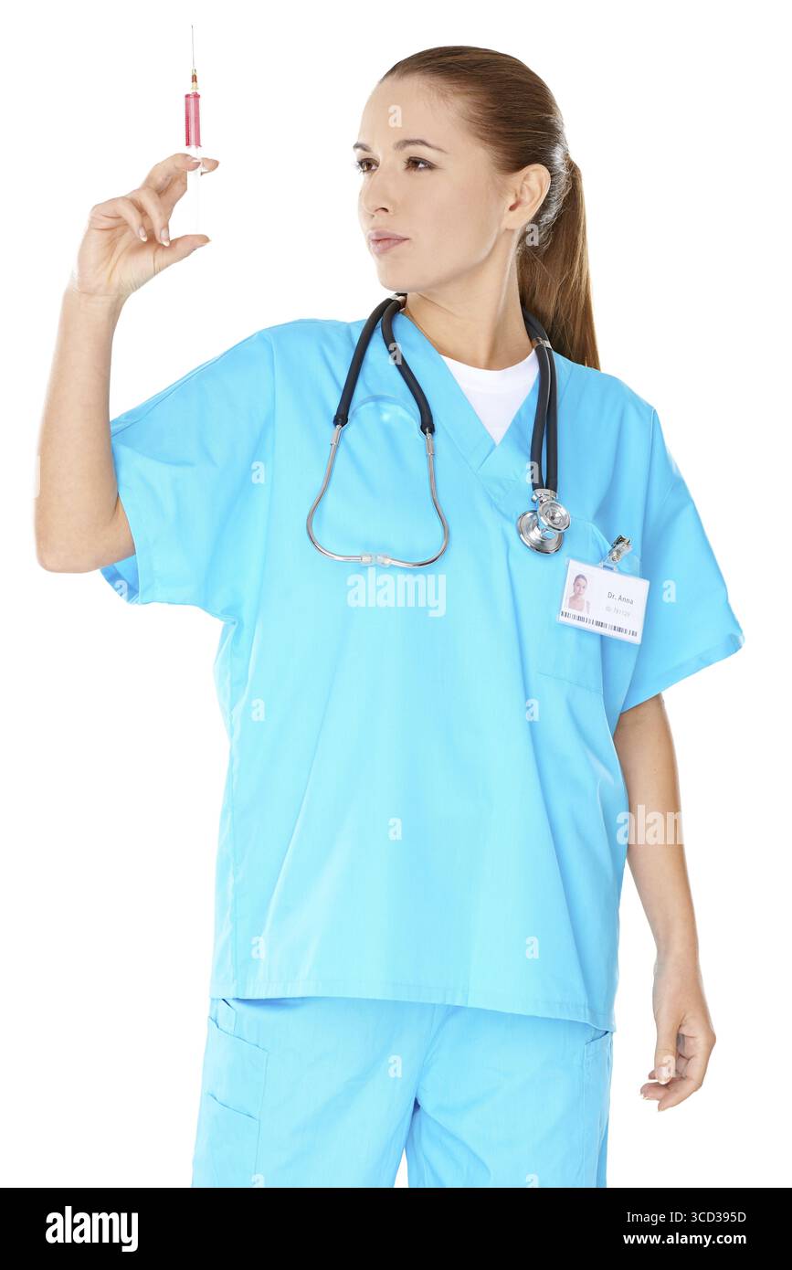 Female doctor carefully preparing injection hi-res stock photography ...