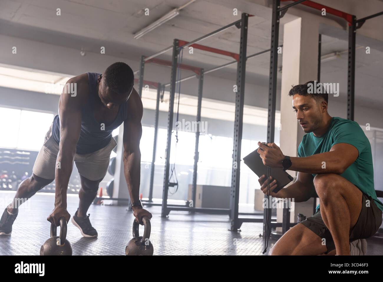 African american male trainee holding hi-res stock photography and ...