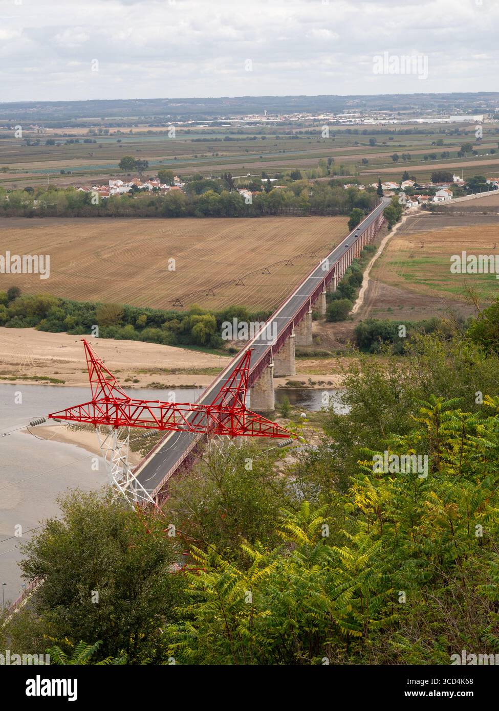 Santarém, Portugal – Panoramic view of a red metal bridge crossing the ...