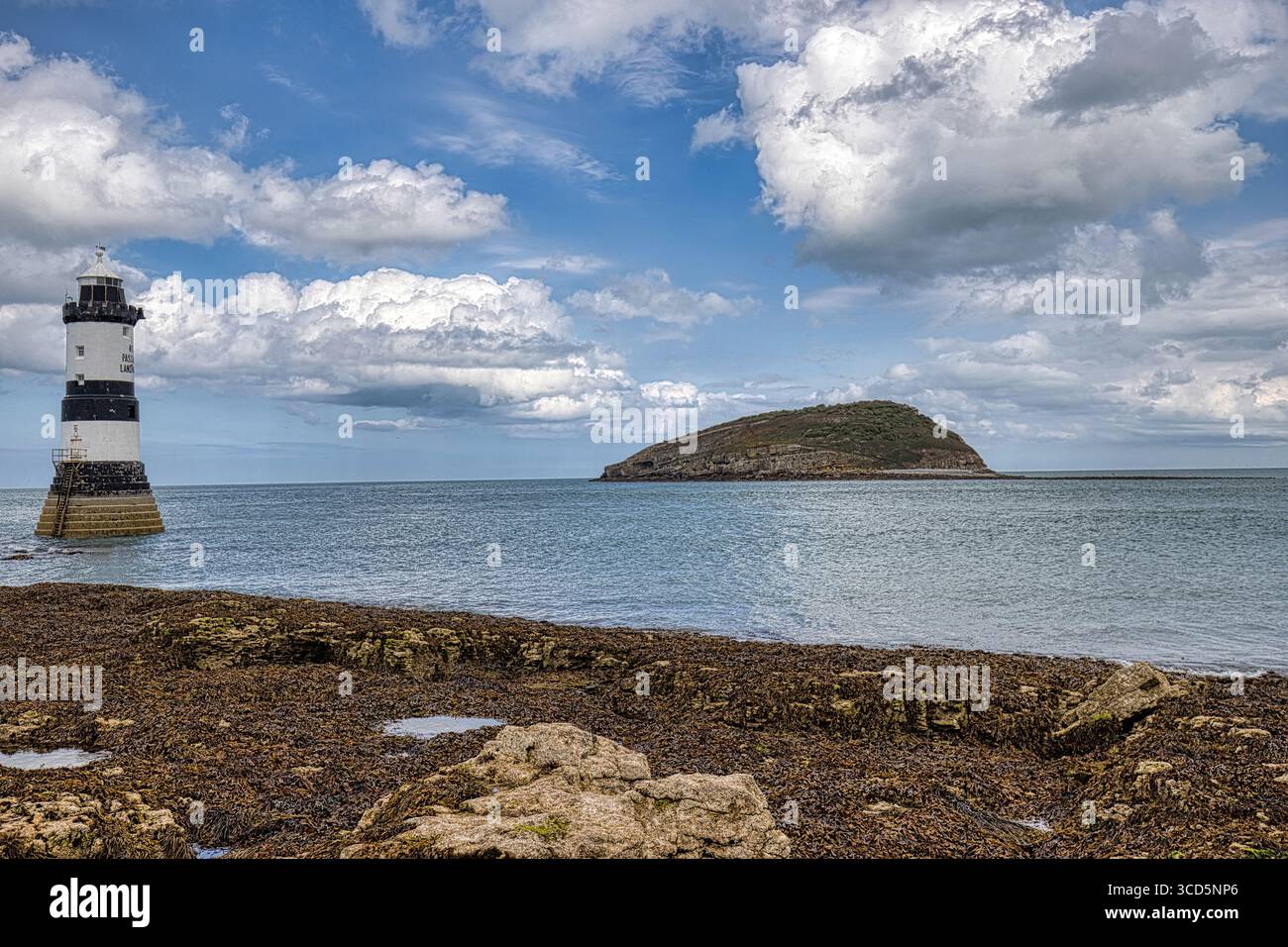 Penmon Lighthouse and Puffin Island, Anglesey, North Wales, UK Stock ...