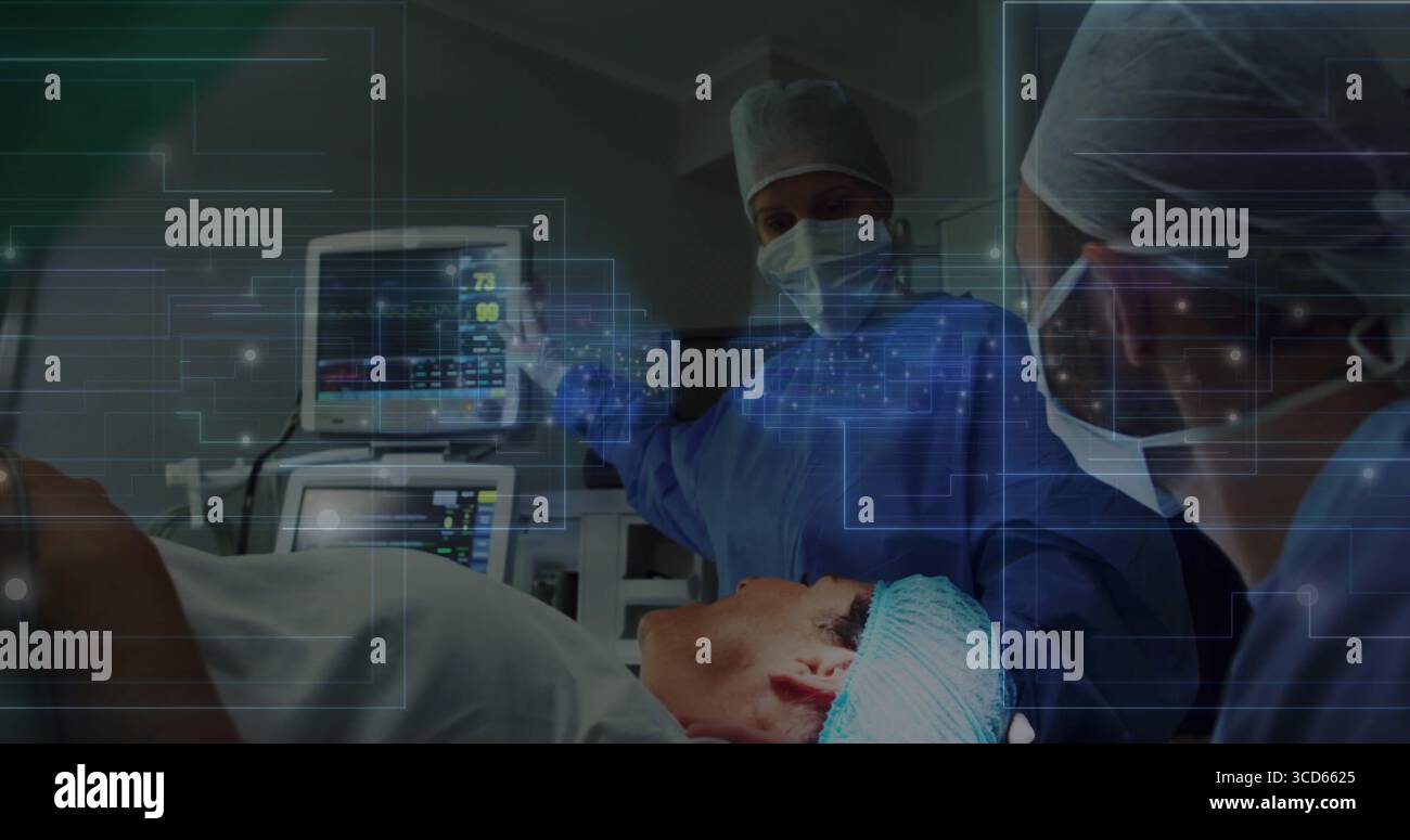 Pointing surgeon monitoring patient in OR with vital signs monitor and ...