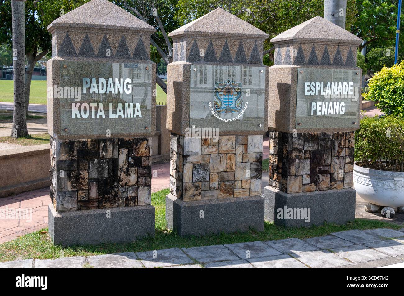 Left to right are three small monuments of Padang Kota Lana, Majlis ...