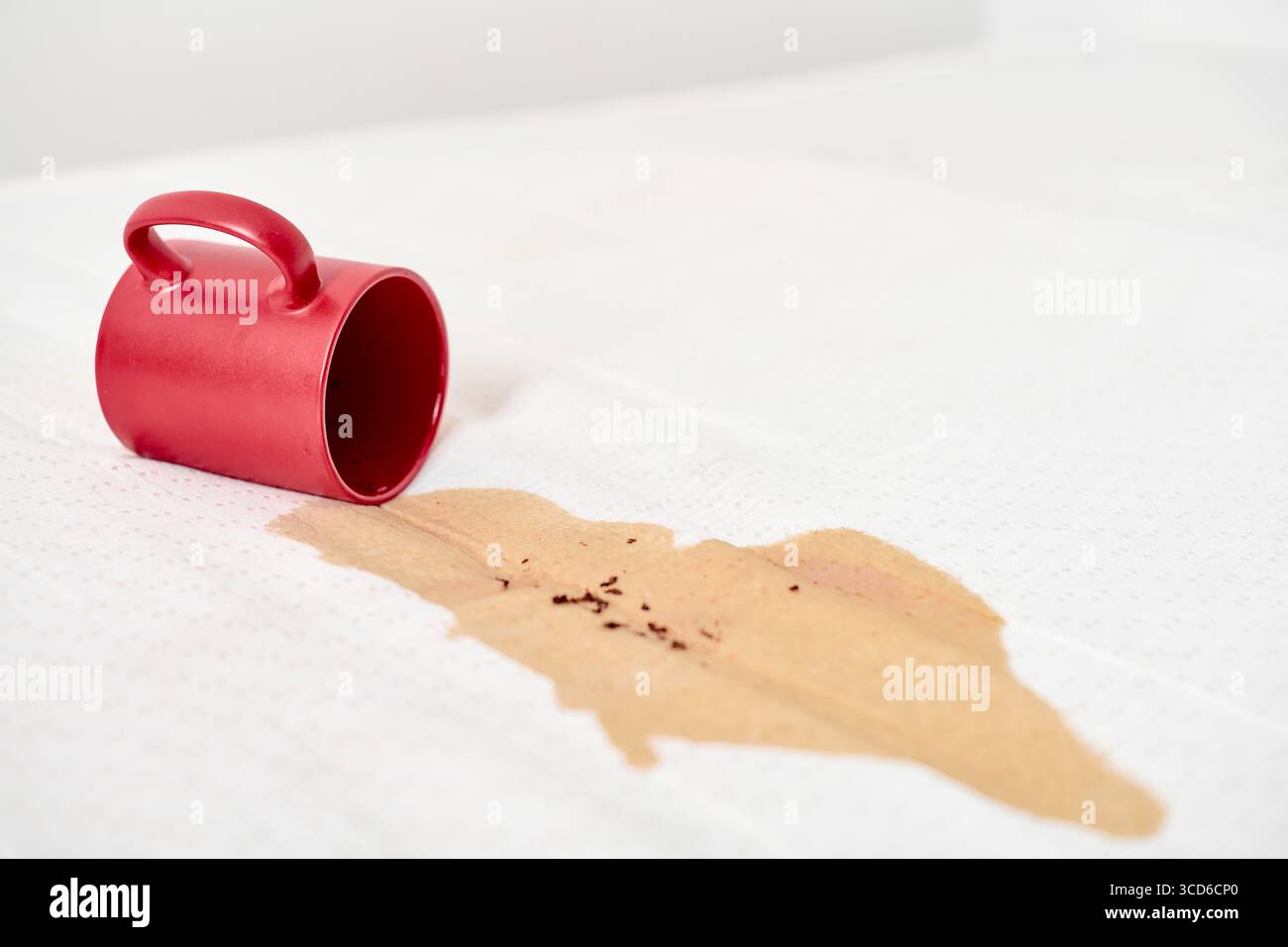 Mug tips over spilling coffee hi-res stock photography and images - Alamy