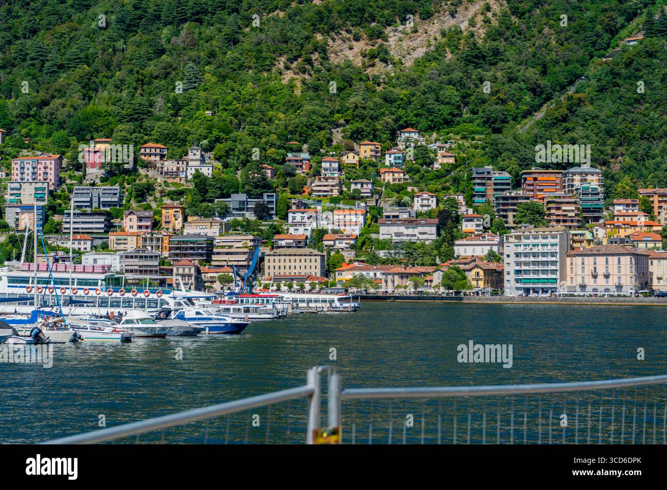 Como city on mountain. Old houses building architecture on lake Como ...