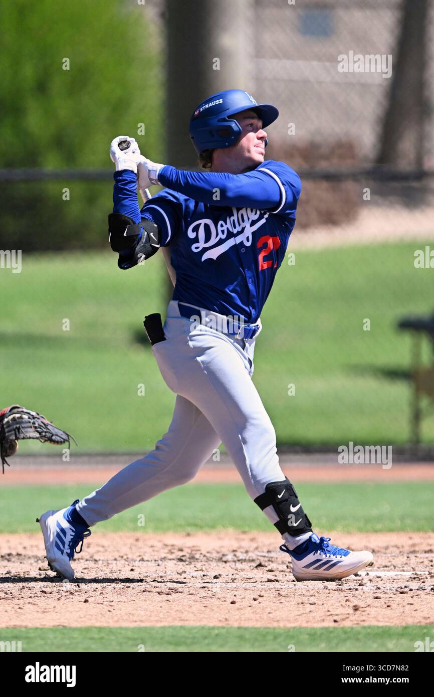 Charles Davalan (27) of the Los Angeles Dodgers follows through on a ...