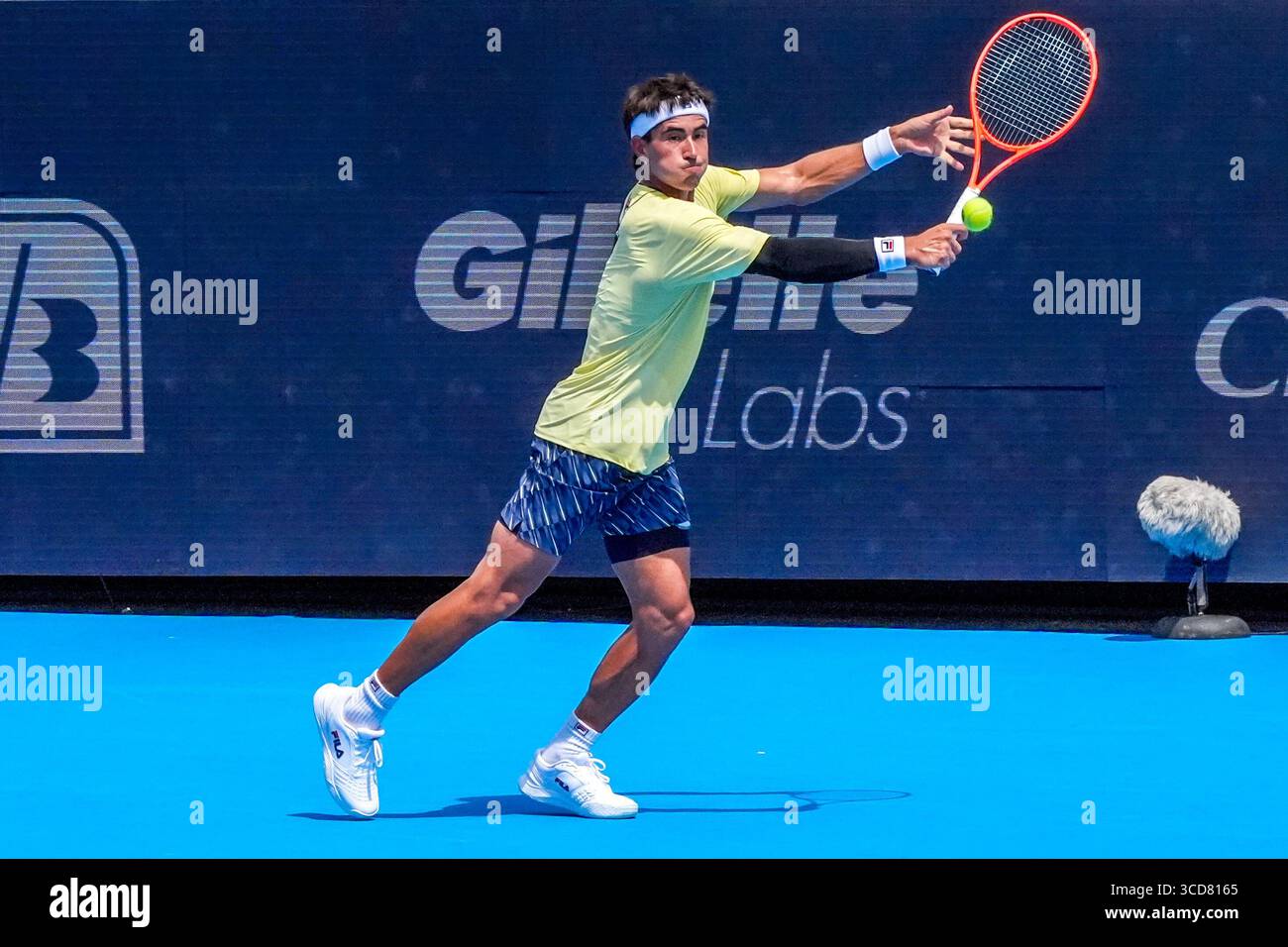 MASON, OH-AUG 12: Francisco Comesana (ARG) returns a shot to Reilly Opelka (not pictured) during ...