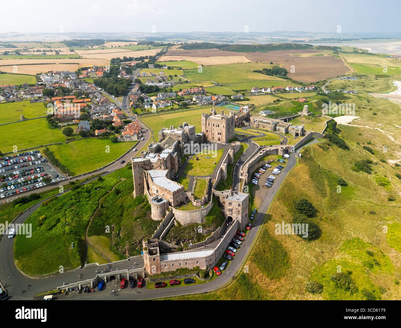 Aerial view of Bamburgh Castle in Bamburgh, Northumberland, England, UK ...