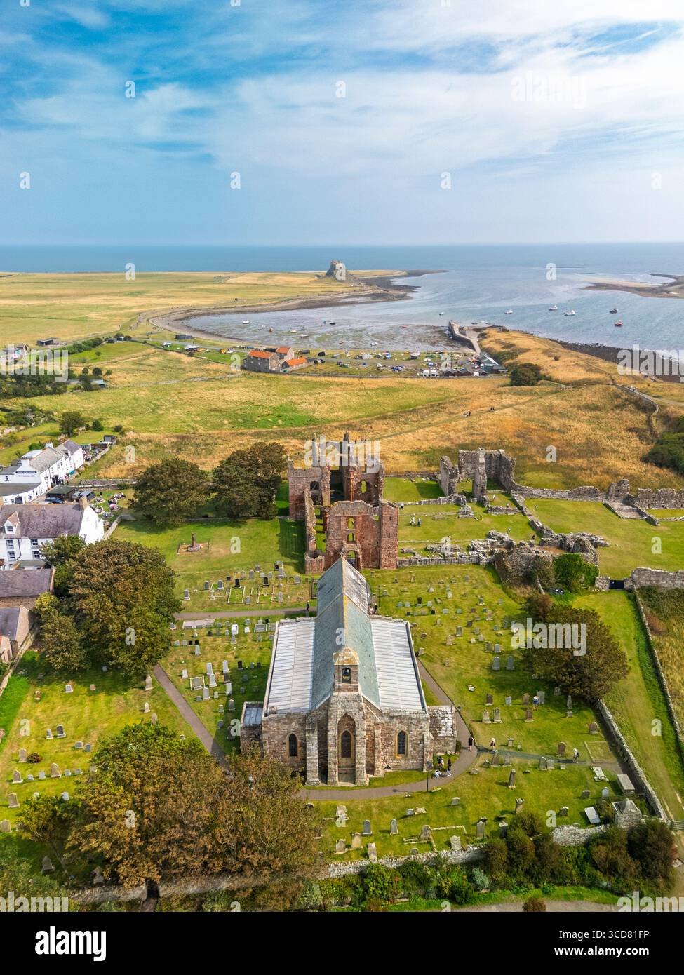 Aerial view of St Mary the Virgin Church and Lindisfarne Priory on ...