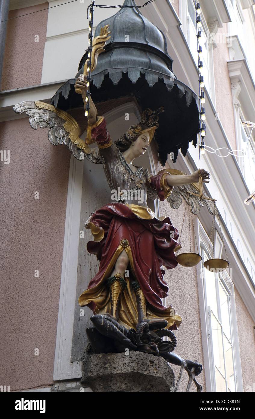 Saint Michael street statue in Salzburg, Austria Stock Photo - Alamy