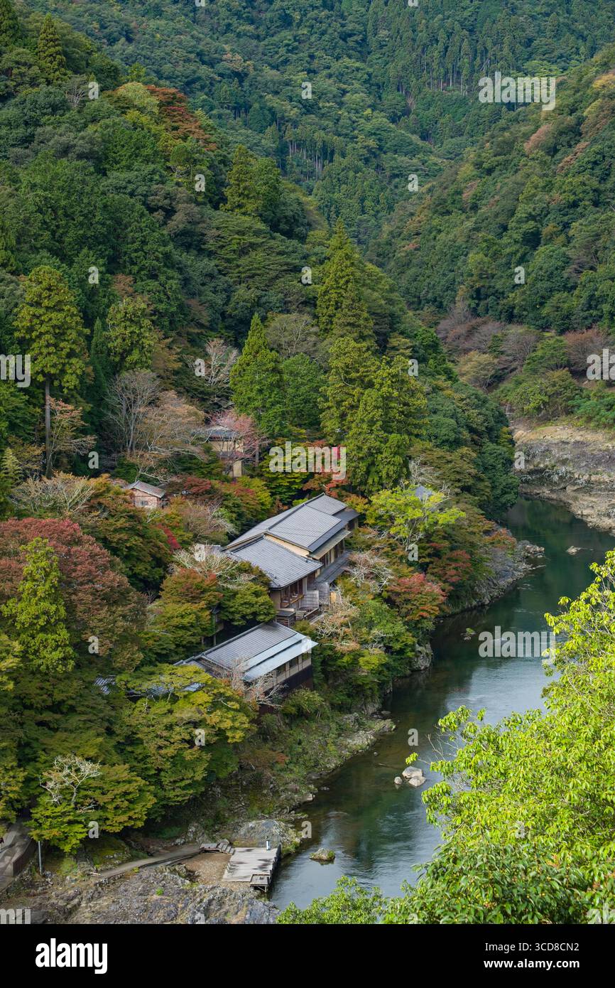 HOSHINOYA Kyoto hotel above the Katsura River seen from Arashiyama Park ...