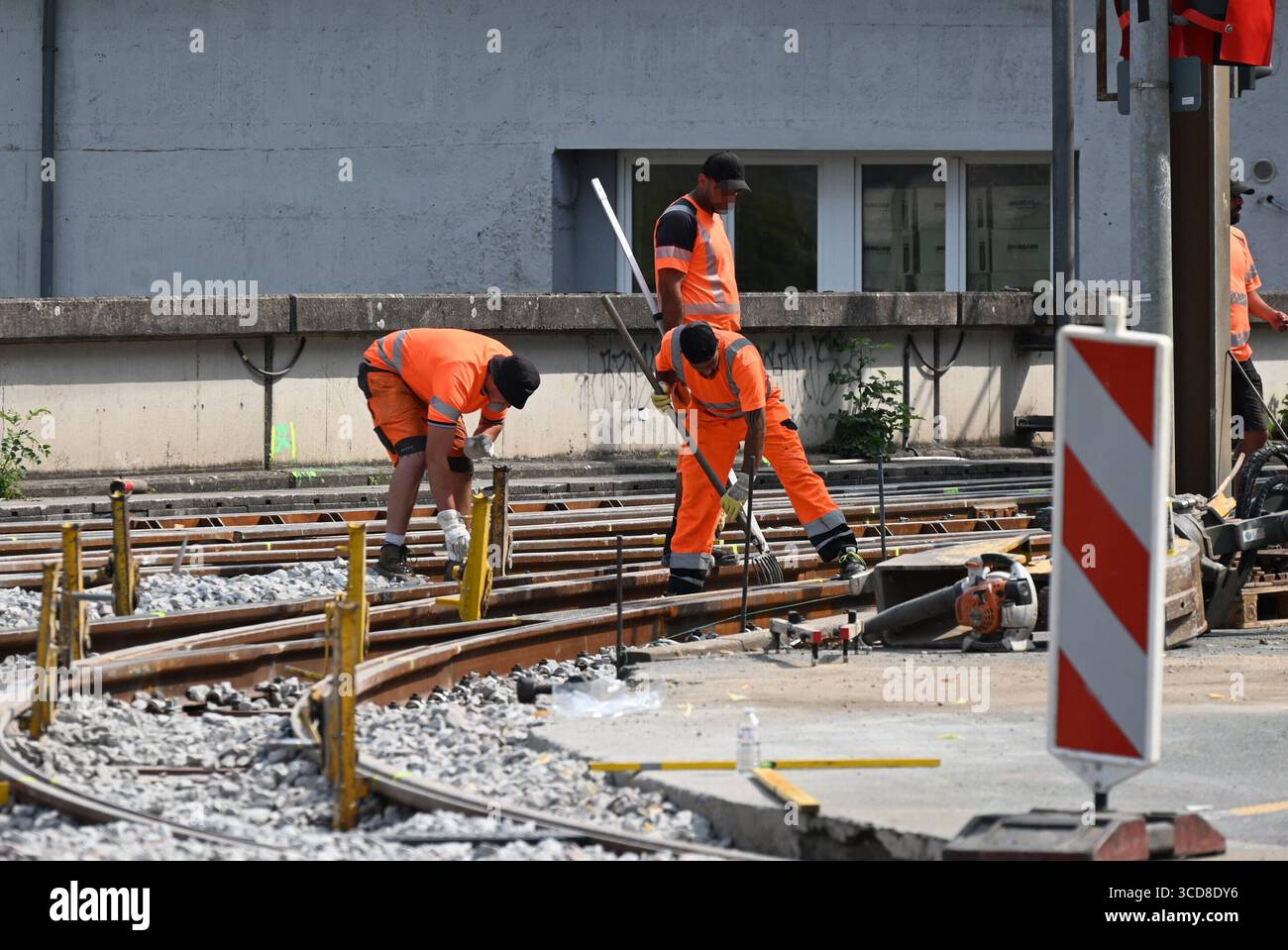 Construction workers at work, road construction, sewer construction ...