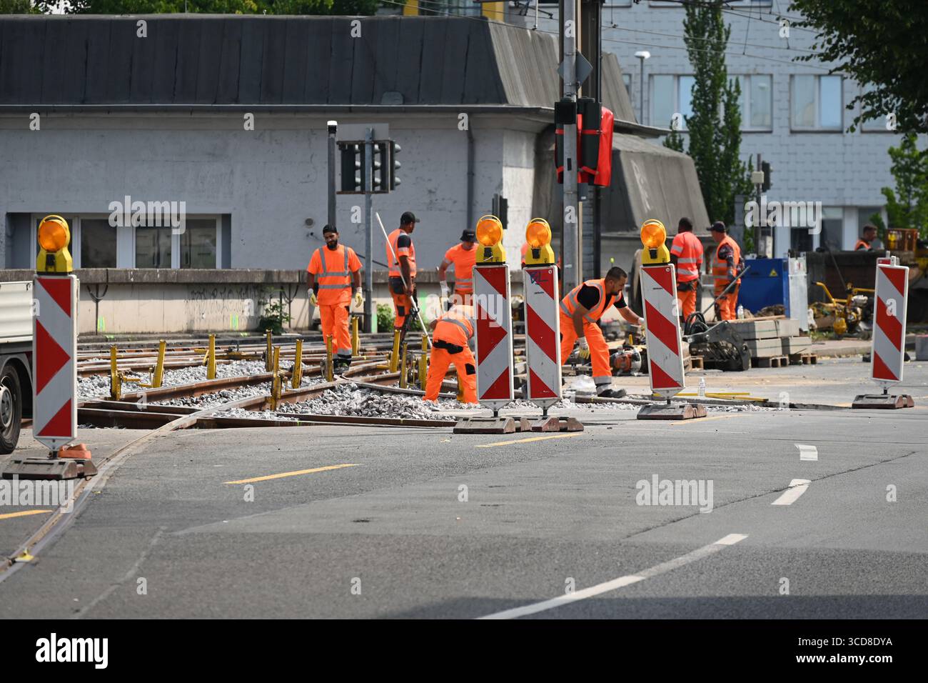 Construction workers at work, road construction, sewer construction, renovation, repair, feature ...