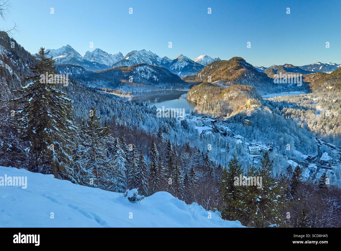 This photograph offers a stunning view of a snowy mountain landscape ...