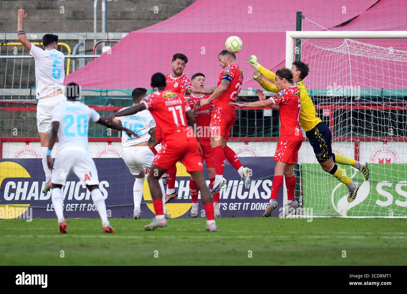 Shelbourne's Patrick Barrett (centre) heads the ball clear from a ...