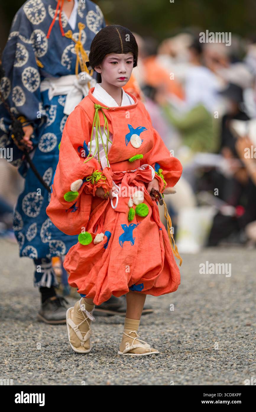Japanese female child dressed in Kamakura Period attire walking in ...