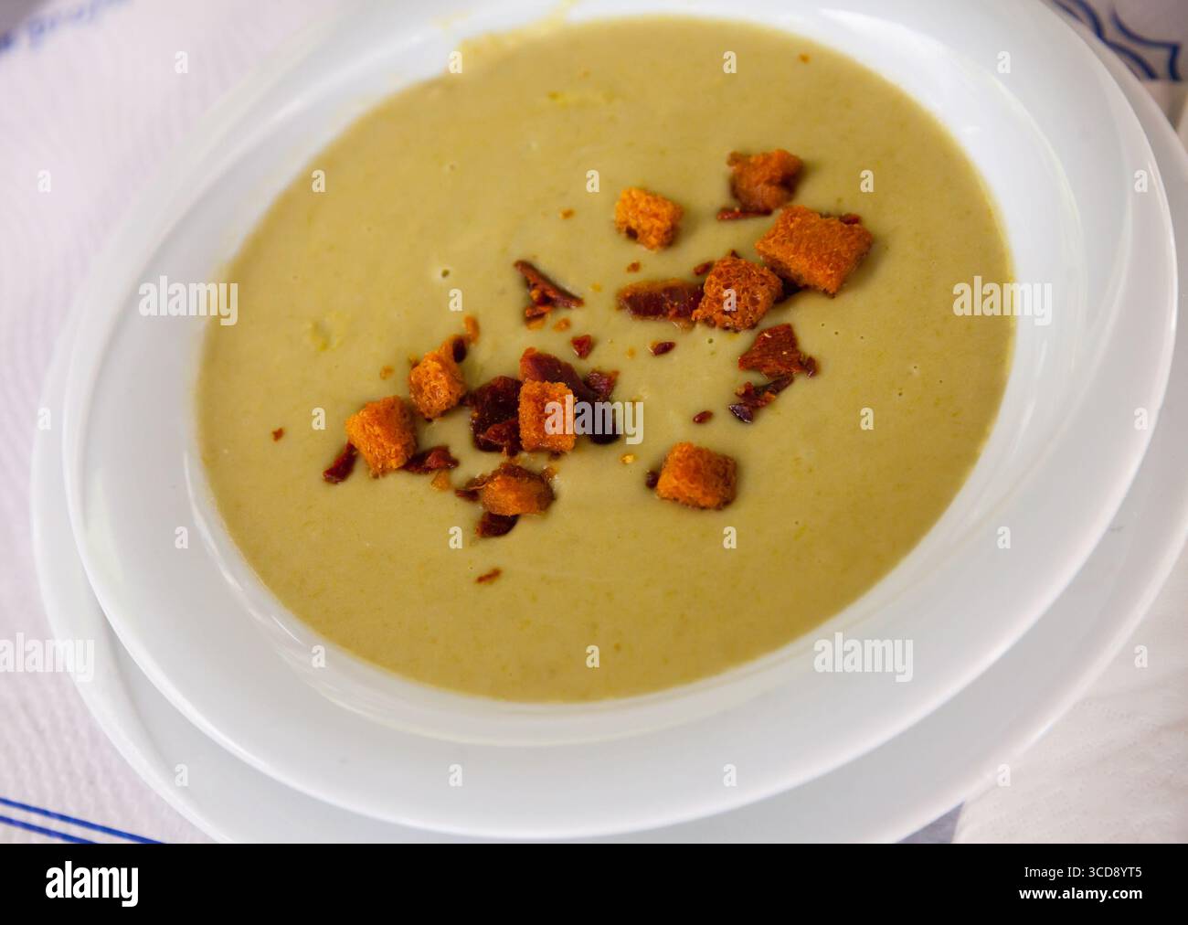 Vegetable soup puree with croutons Stock Photo - Alamy