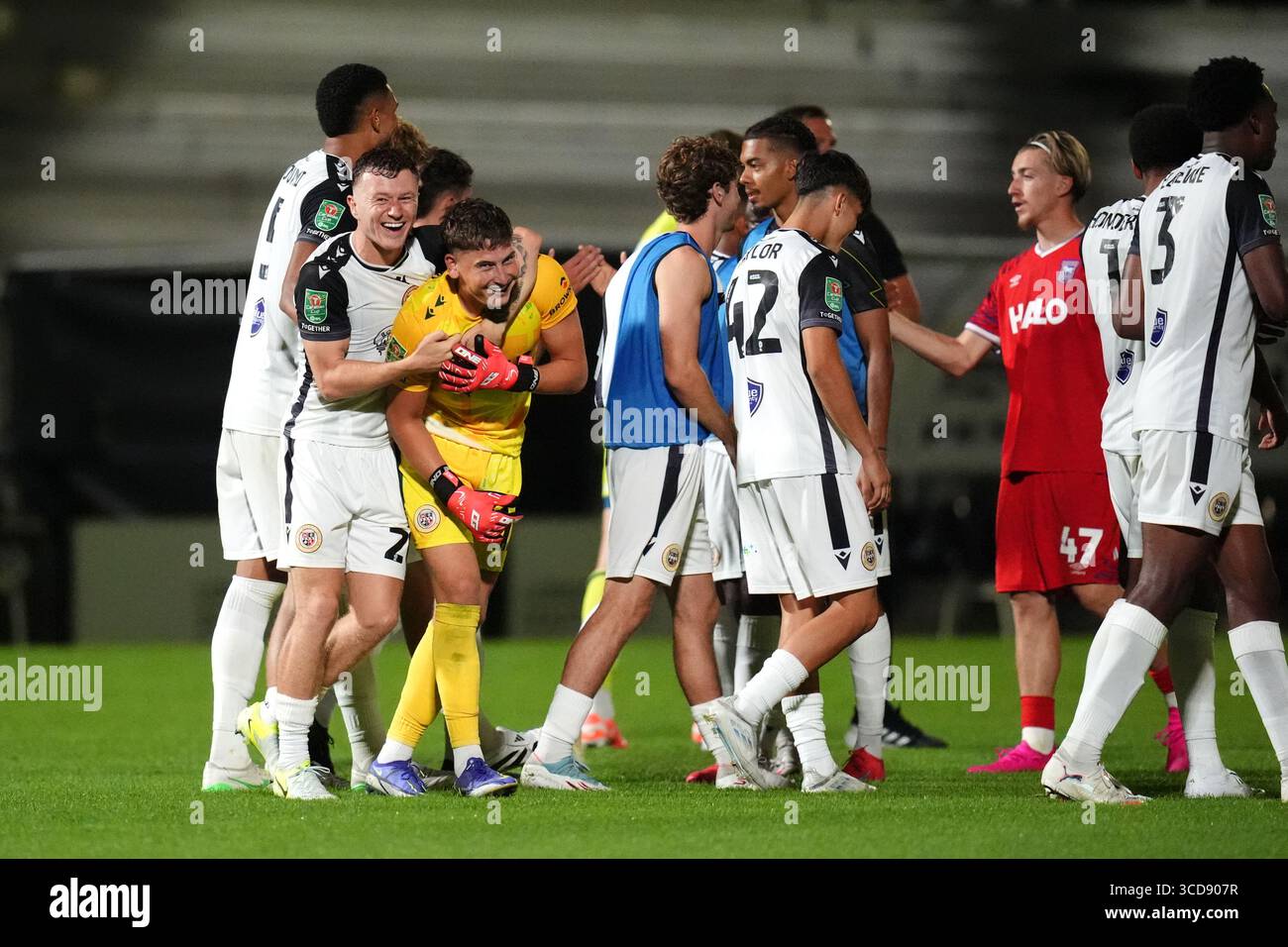 Bromley goalkeeper Sam Long celebrates victory in the penalty shoot-out ...