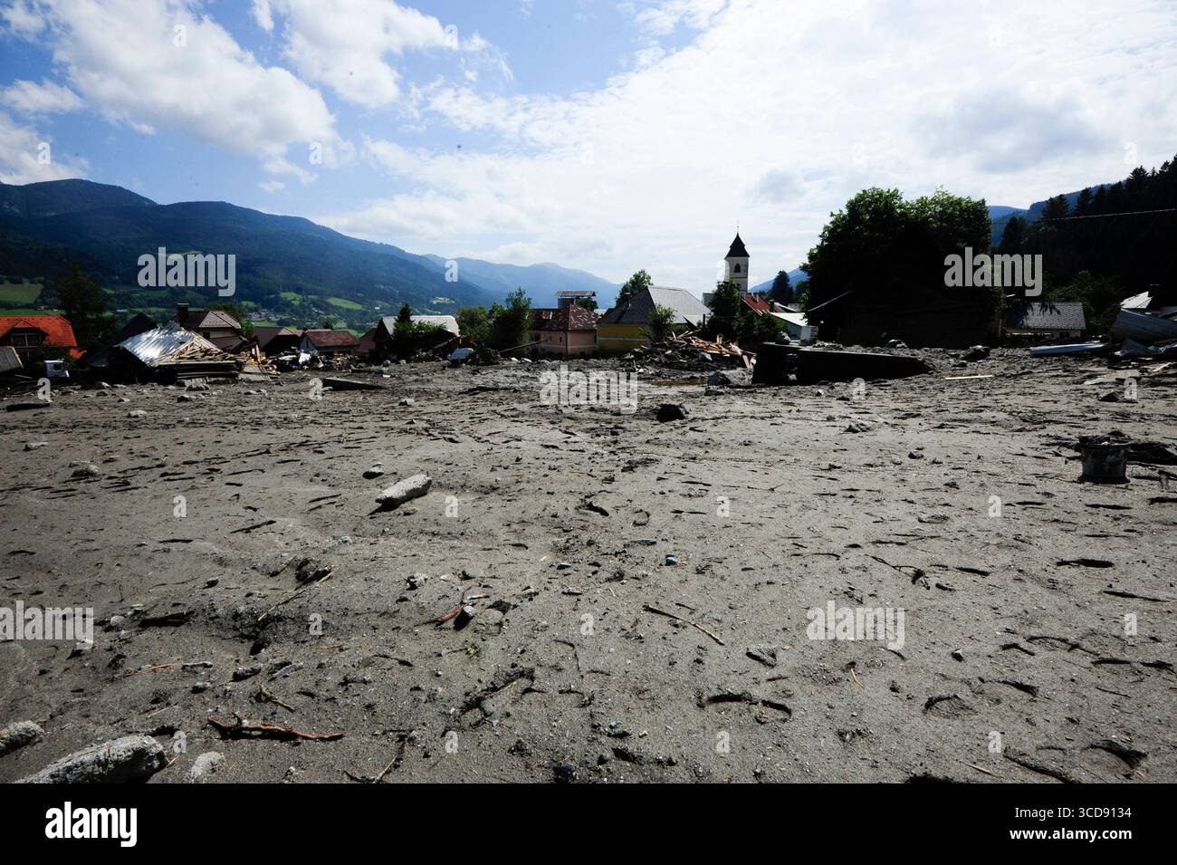 storm damage caused by mudslides, debris and mud after heavy rainfalls ...
