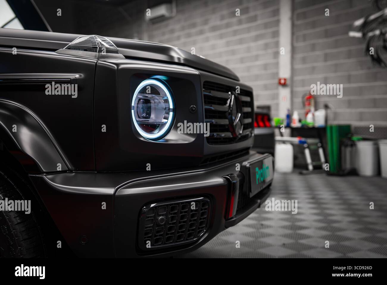 Close Up of Black Mercedes AMG G Class Front End in Garage Stock Photo ...