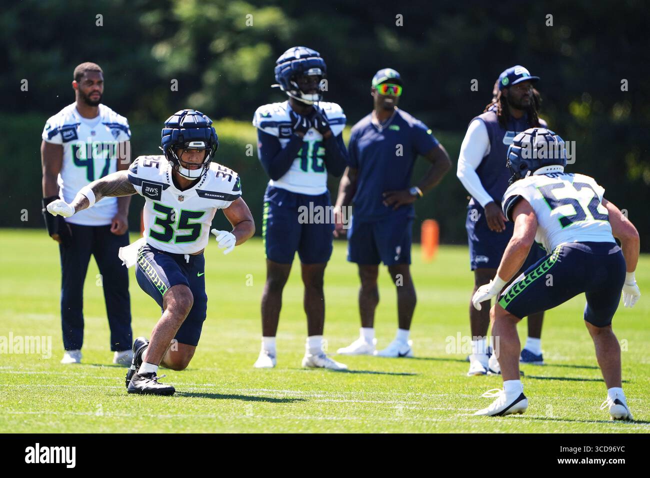 Seattle Seahawks linebacker Alphonzo Tuputala (35) runs a drill with ...