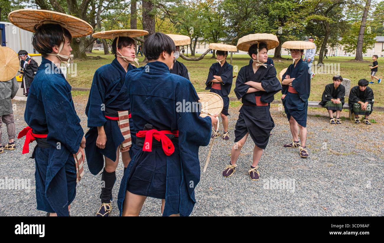 Young men dressed in Edo Period attire standing together before the ...