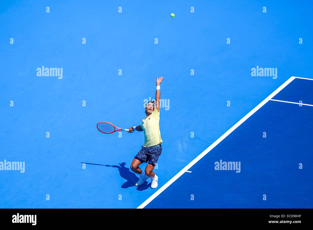 MASON, OH-AUG 12: Francisco Comesana (ARG) serves to Reilly Opelka (not ...