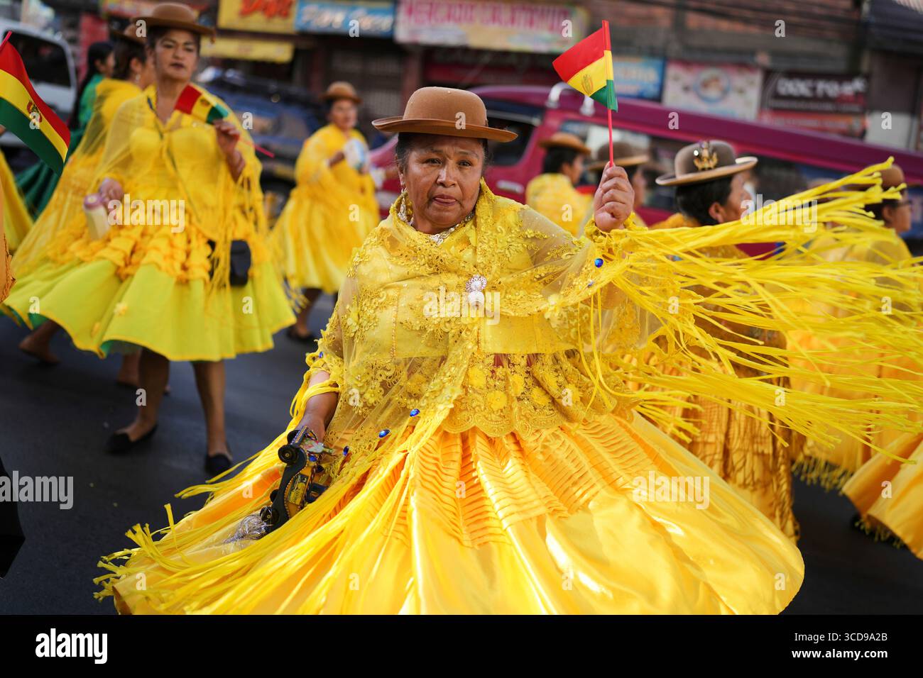 A supporter of presidential candidate Samuel Doria Medina dances during ...
