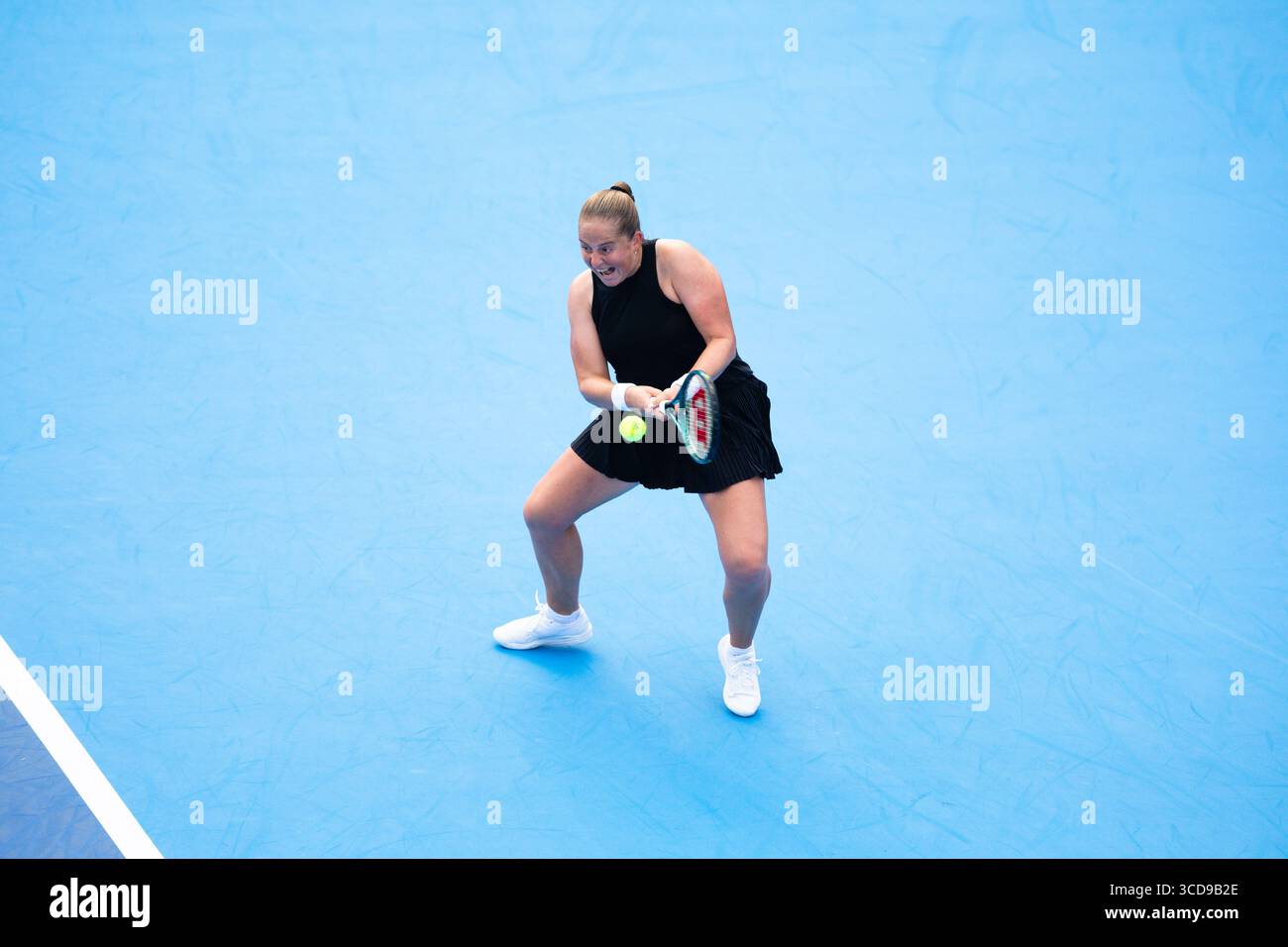 MASON, OHIO - AUGUST 12: Jelena Ostapenko of Latvia hits a backhand ...