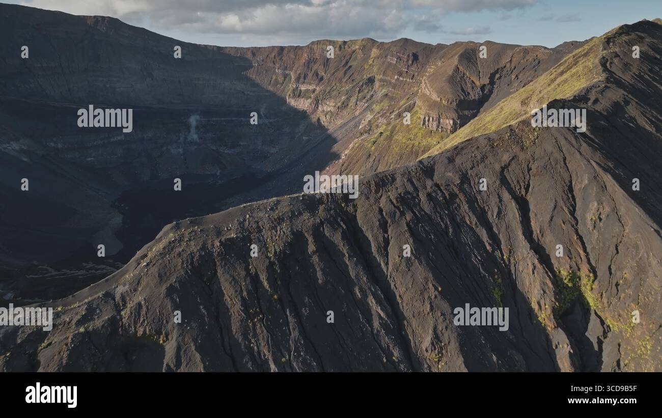 Clouds drift across rugged hi-res stock photography and images - Alamy